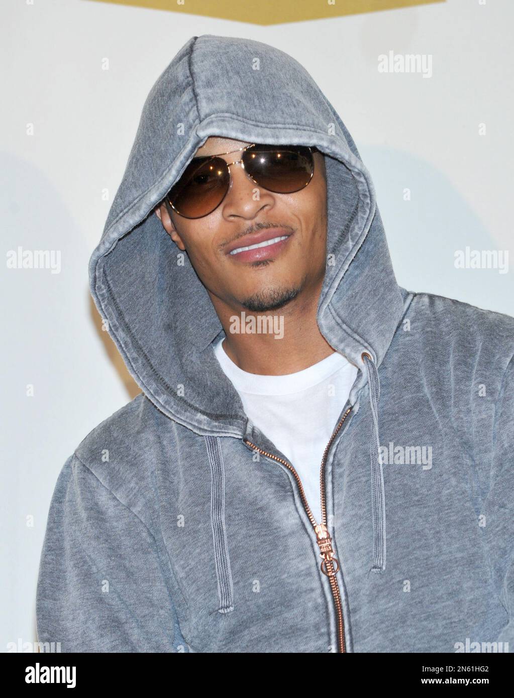 T.I. poses backstage at the Grammy Nominations Concert Live! on Friday ...