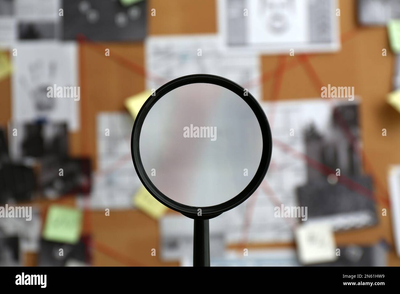 Murder investigation magnifying glass hi-res stock photography and ...