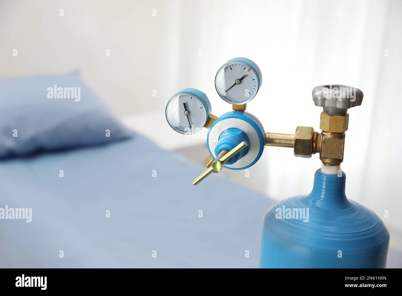 Medical oxygen tank in hospital room, closeup. Space for text Stock ...