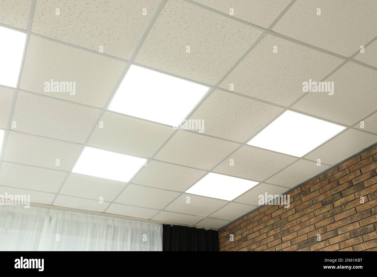 White ceiling with lighting in office room Stock Photo - Alamy