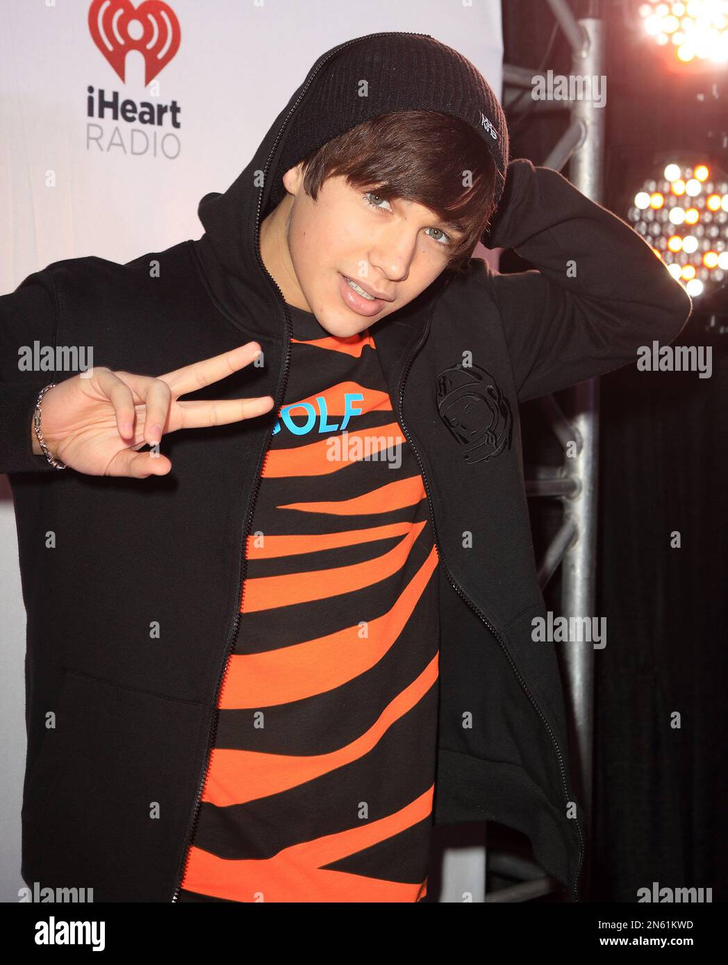 Pop music singer Austin Mahone poses for photographers backstage during ...