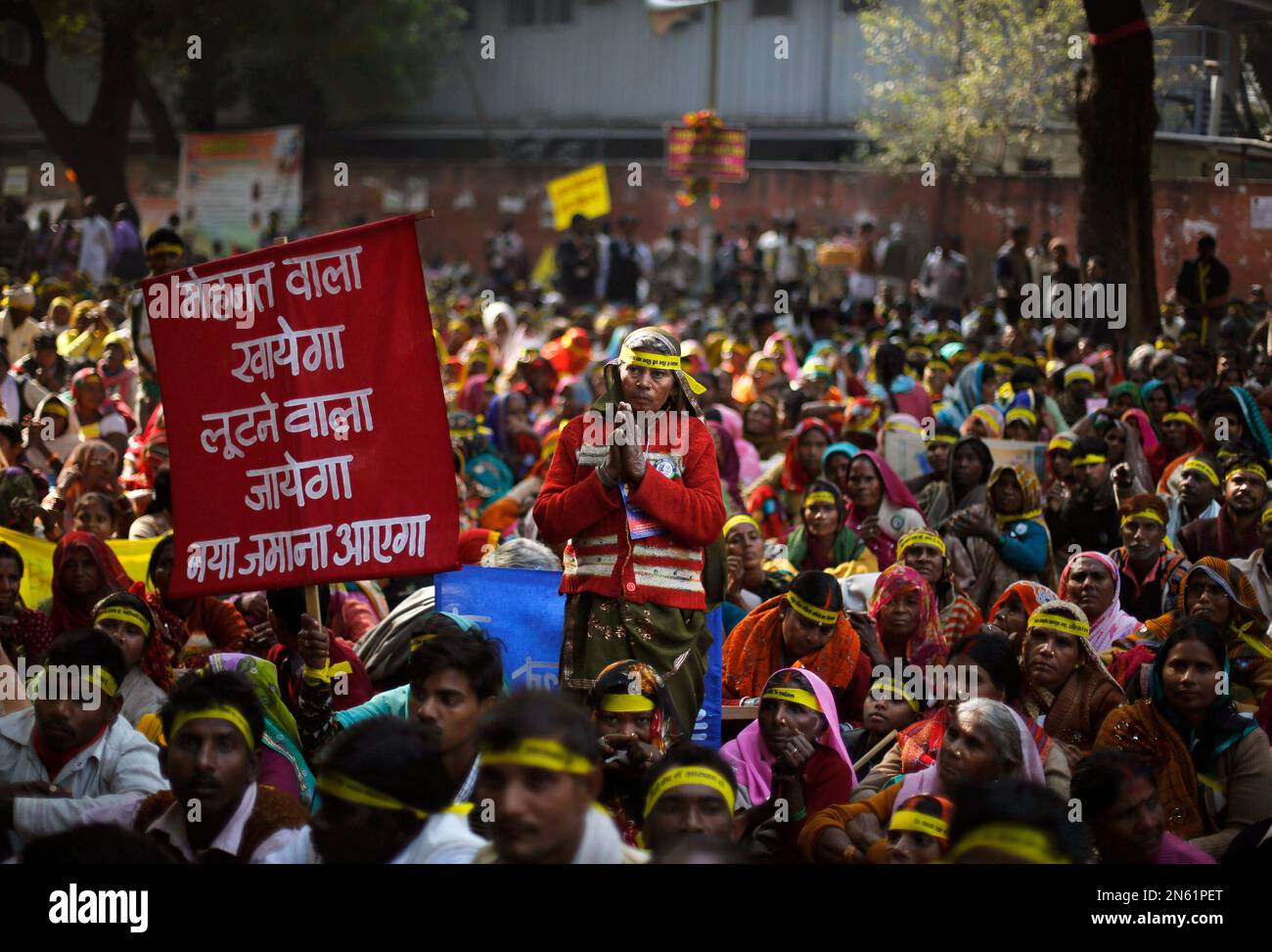An Indian dalit, or untouchable, woman stands with folded hands during ...