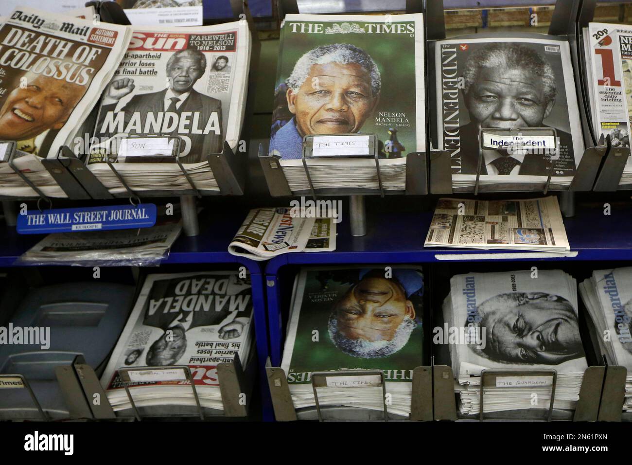 Newspapers with pictures of Nelson Mandela on the front page are on ...