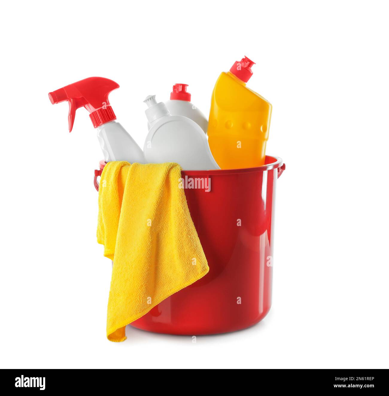 Plastic bucket with different cleaning products and rag on white ...