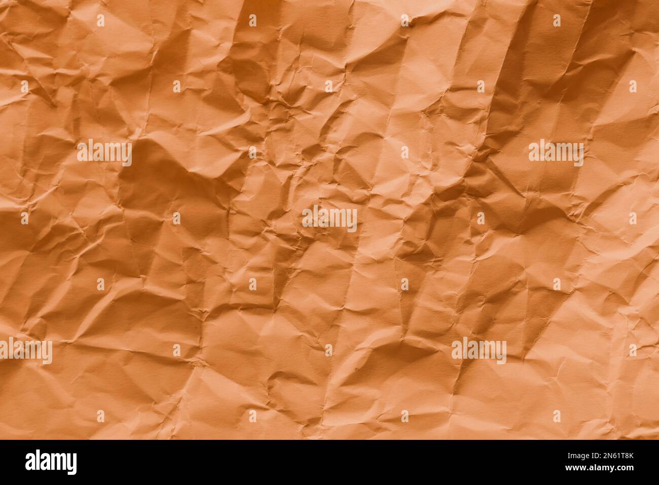 Texture of orange crumpled paper as background, top view Stock Photo ...