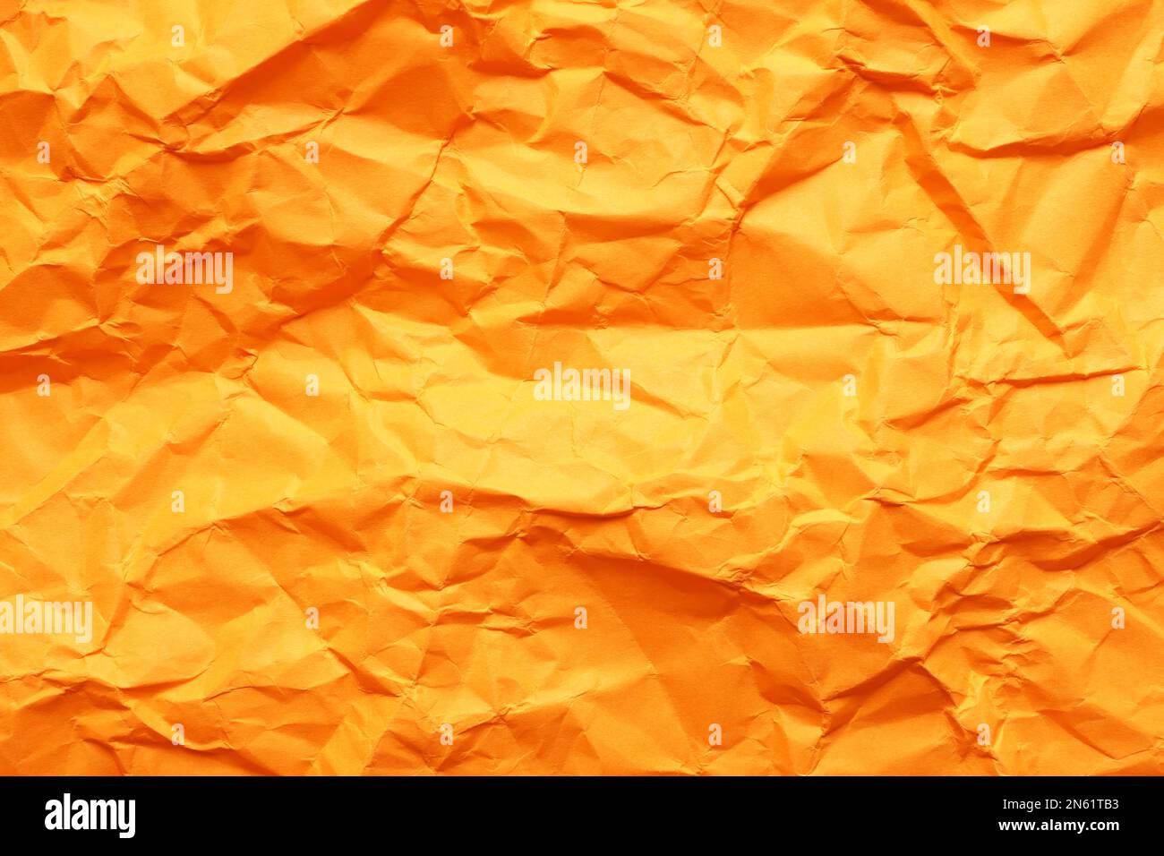 Texture of orange crumpled paper as background, closeup Stock Photo - Alamy