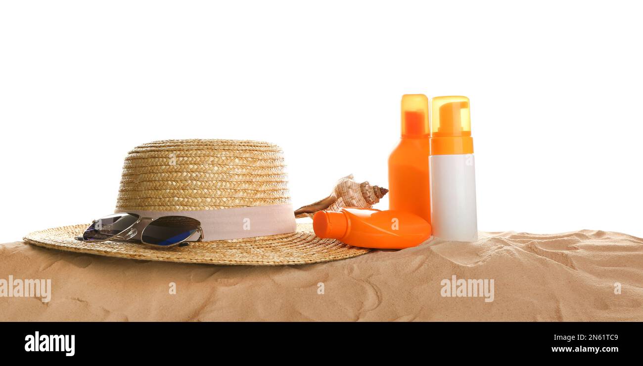 Different beach accessories on sand against white background Stock ...