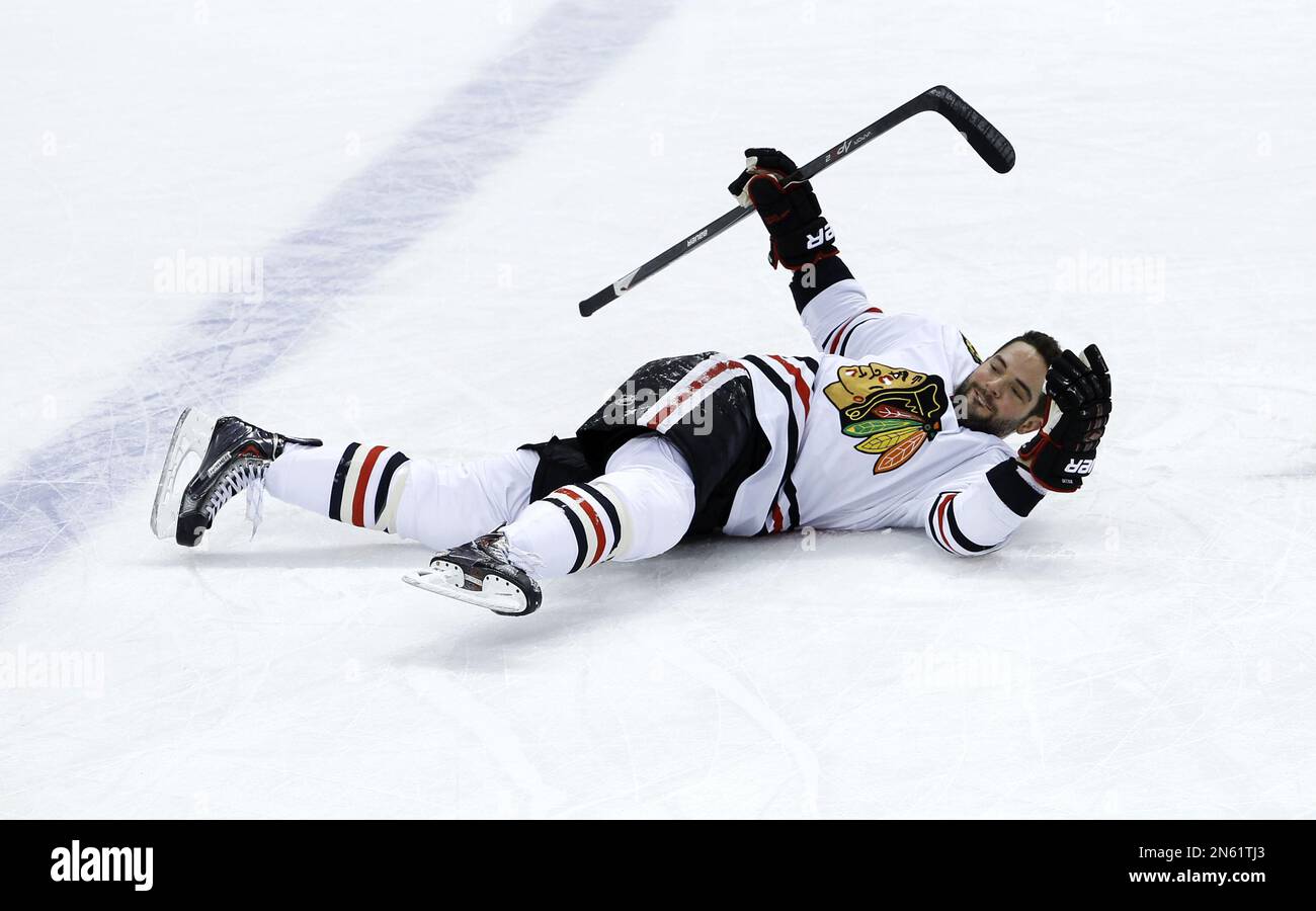 Chicago Blackhawks left wing Brandon Bollig (52) stretches prior to an ...