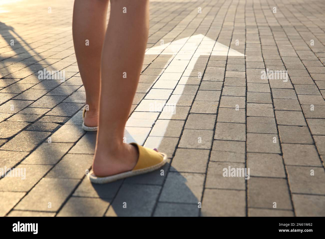 Woman walking along line hi-res stock photography and images - Alamy