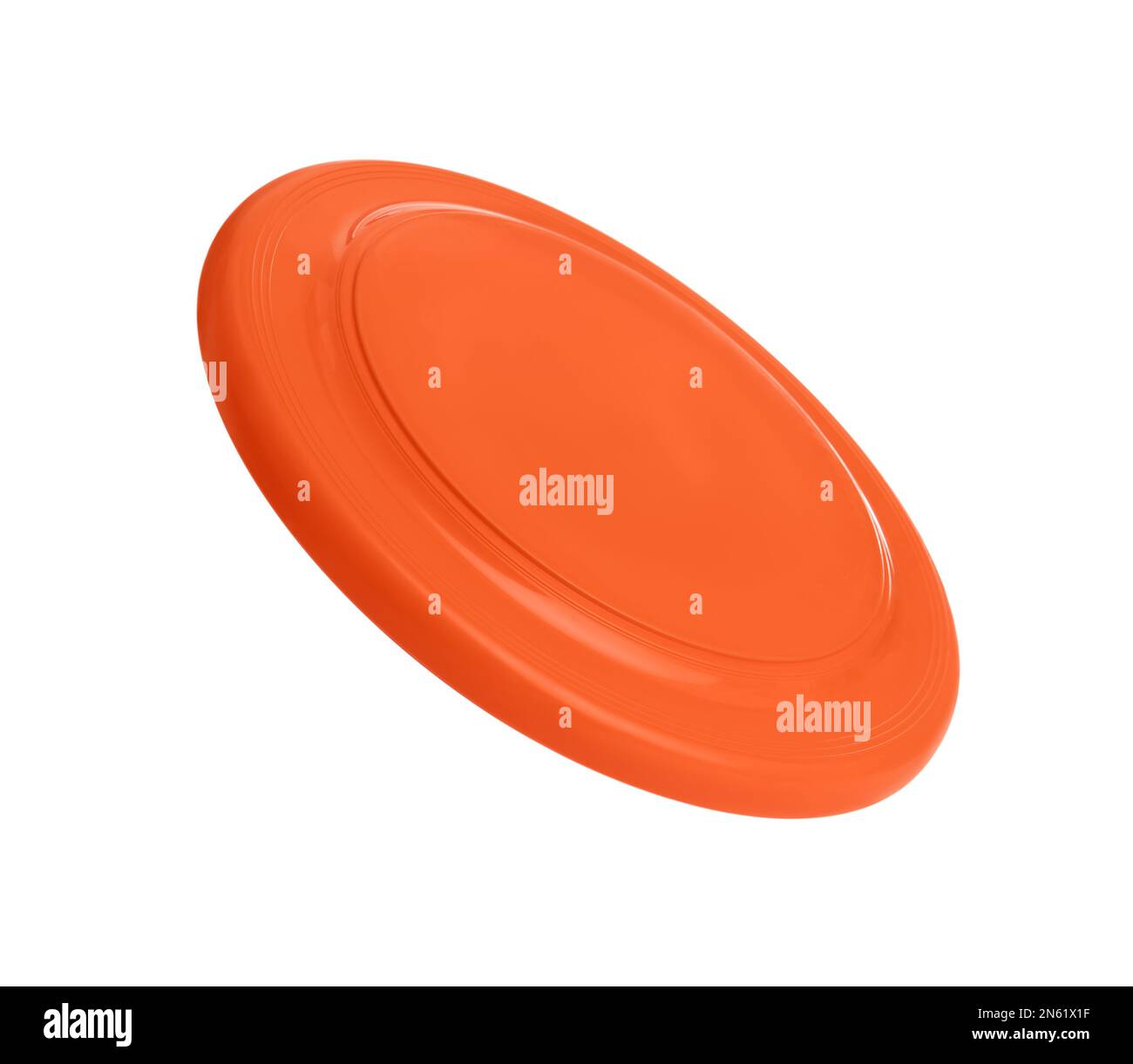 Orange plastic frisbee disk isolated on white Stock Photo - Alamy