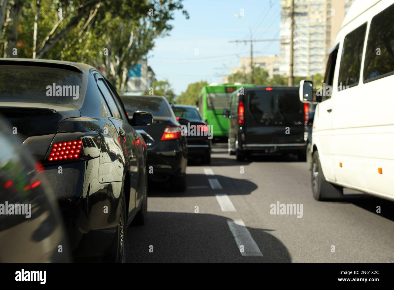 Cars in traffic jam on city street Stock Photo - Alamy