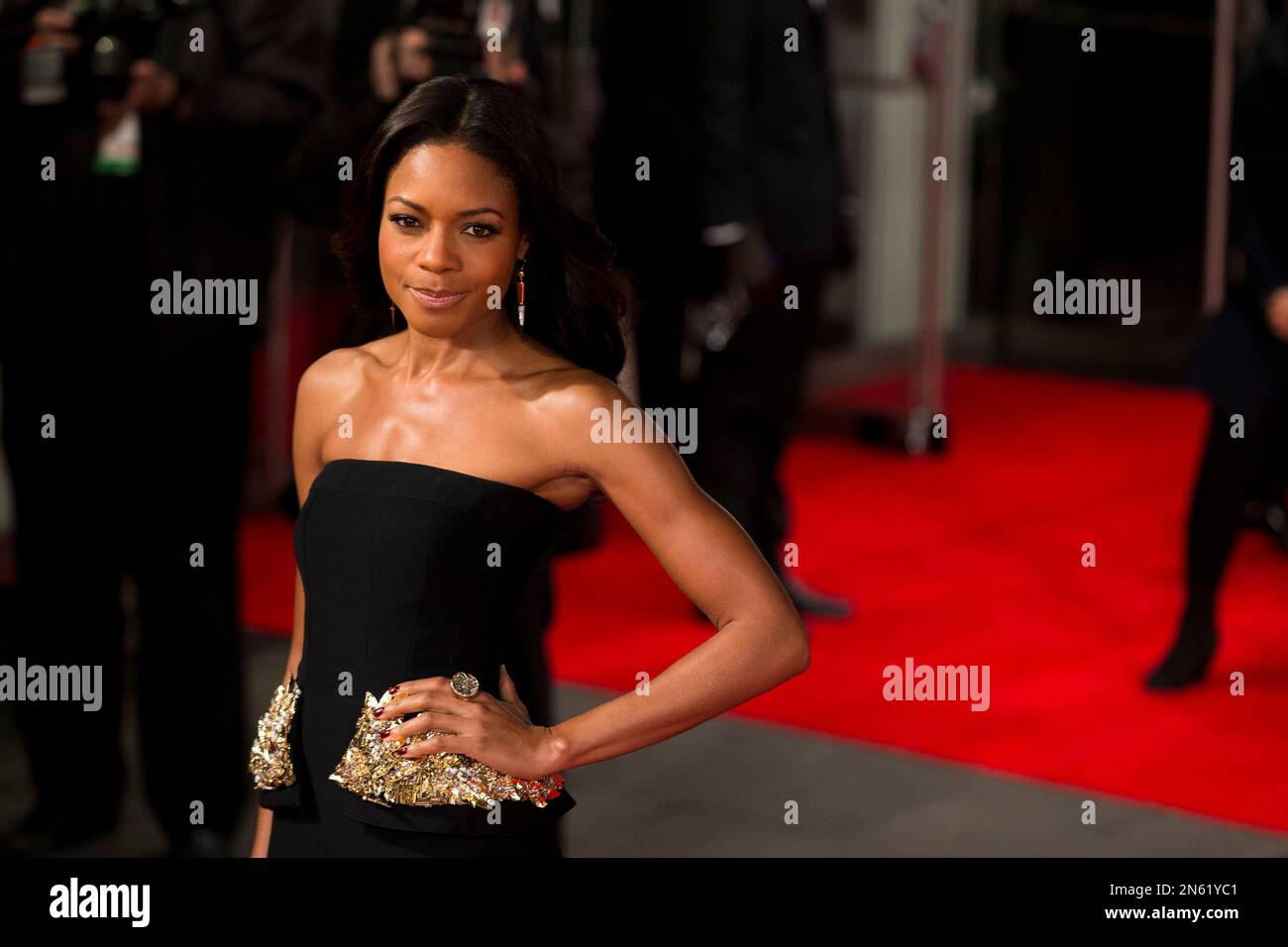 Naomie Harris who plays Winnie Mandela poses for photographers as she ...