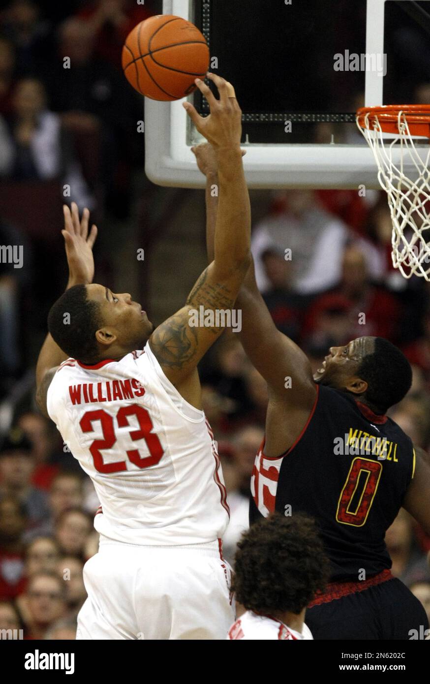 Ohio State's Amir Williams, left, works for a rebound against Maryland ...