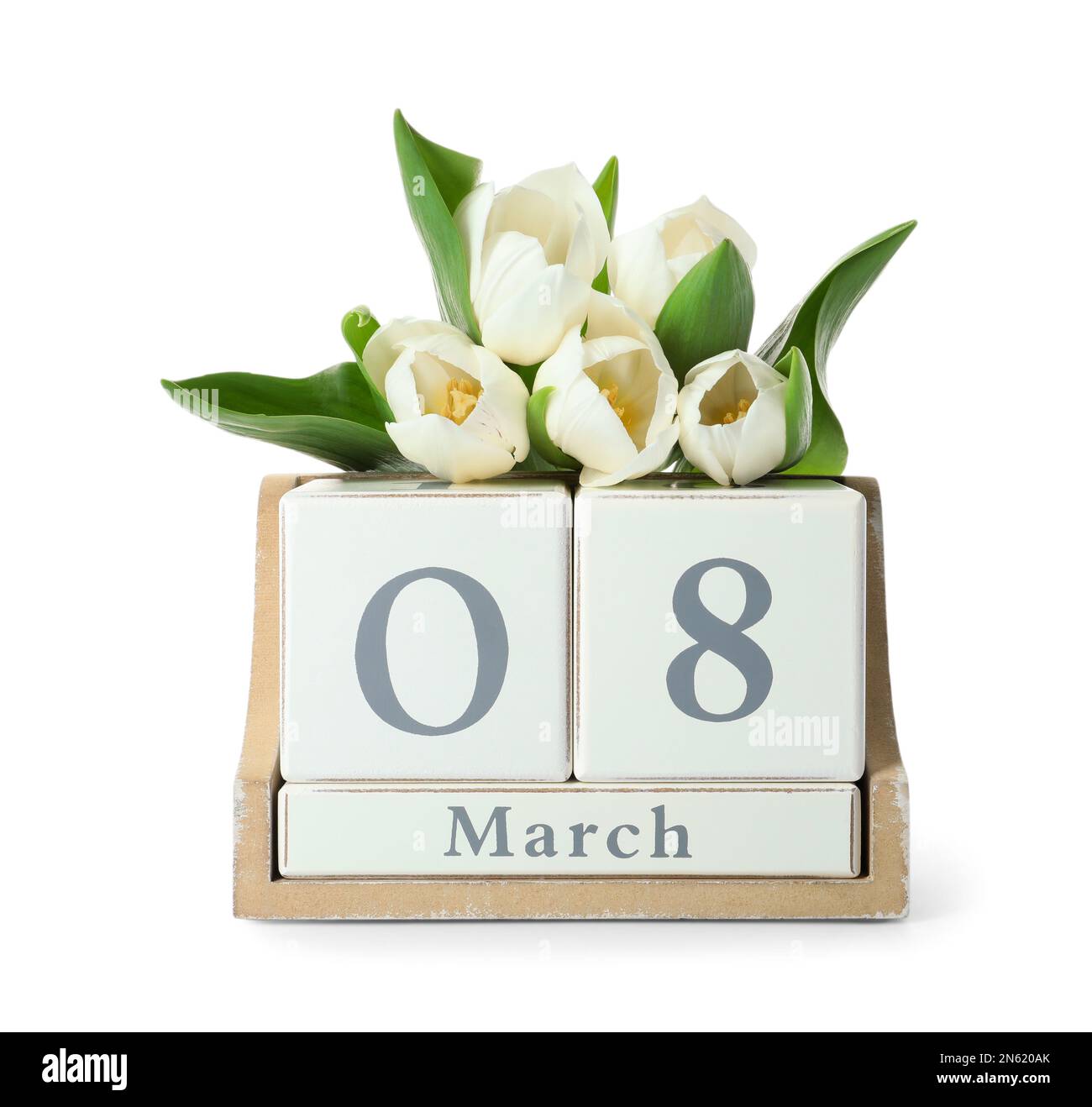 Wooden block calendar with date 8th of March and tulips on white ...