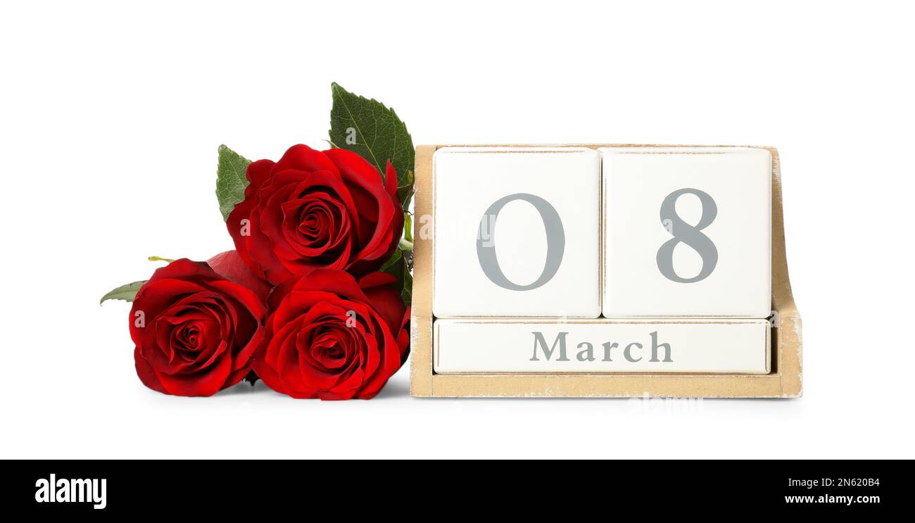 Wooden block calendar with date 8th of March and roses on white ...