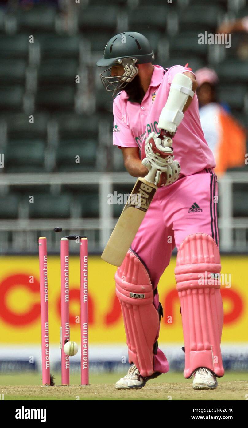 South Africa's batsman Hashim Amla, is bowled by India's bowler ...
