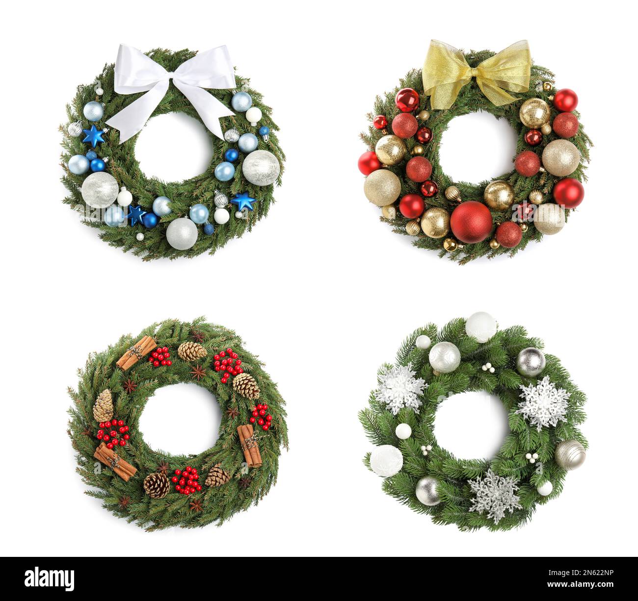 Set with beautiful Christmas wreaths on white background Stock Photo ...