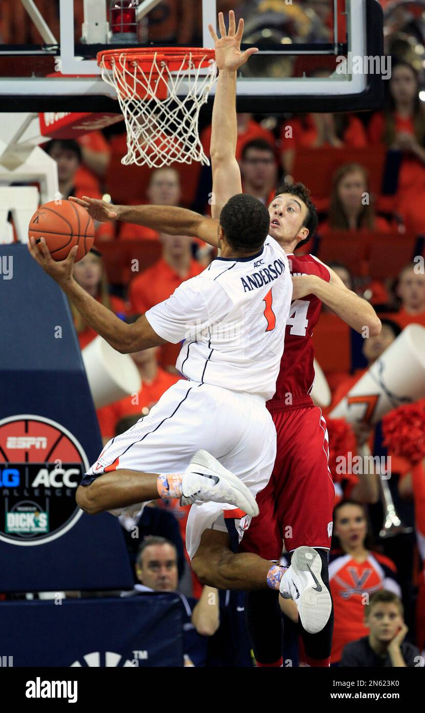 Virginia guard Justin Anderson (1) takes a shot as Wisconsin forward ...