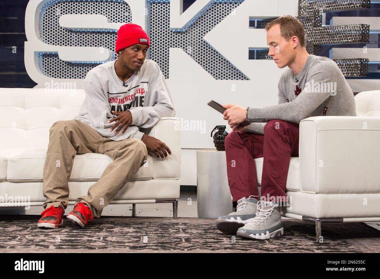 Hopsin (L) and host DJ Skee on set during filming of SKEE Live on ...