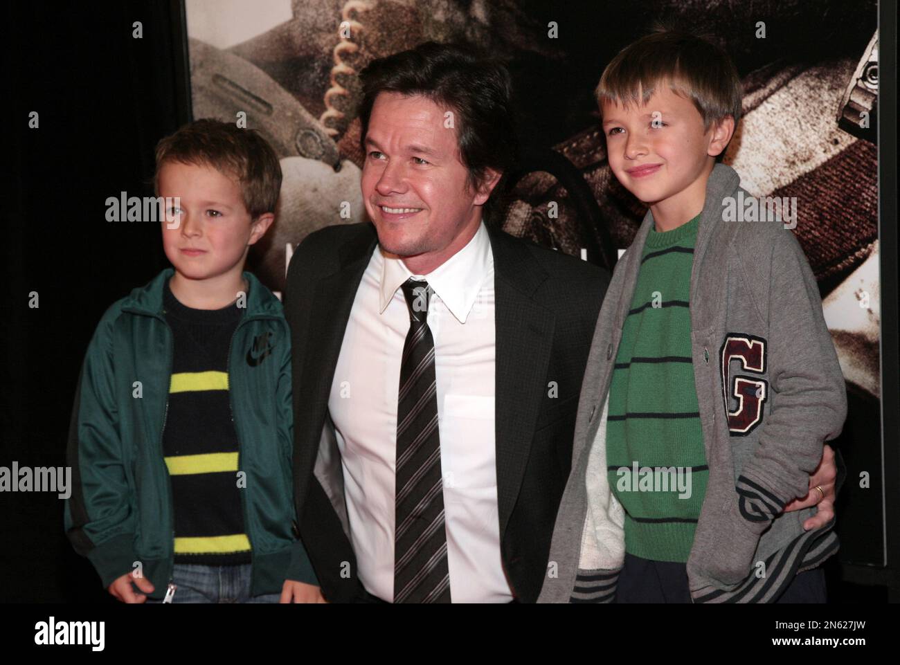 Actor Mark Wahlberg, center, with his sons Brendan Wahlberg, left, and ...