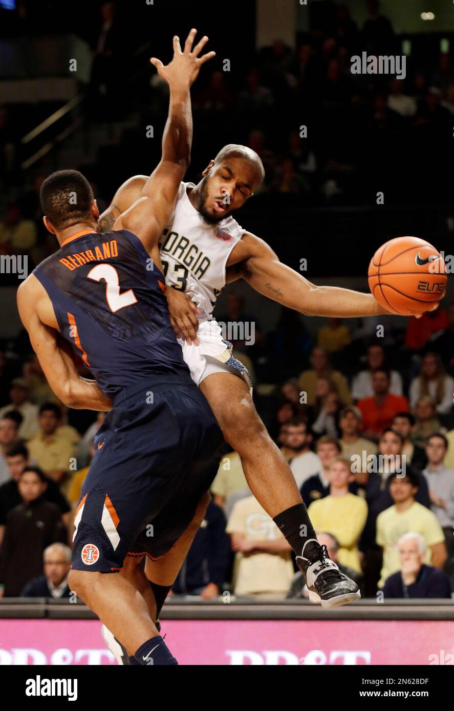 Georgia Tech guard Trae Golden, right, passes the ball as Illinois ...