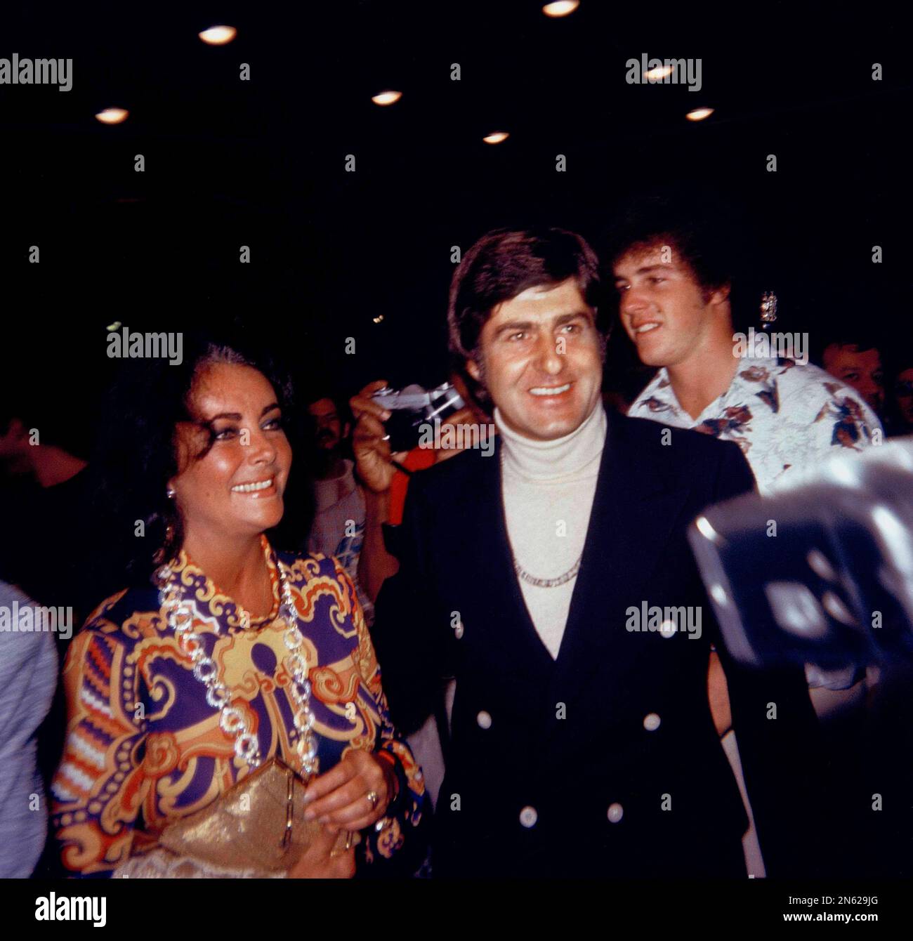 Actress Elizabeth Taylor shown with Henry Wynberg, 1974. Location ...