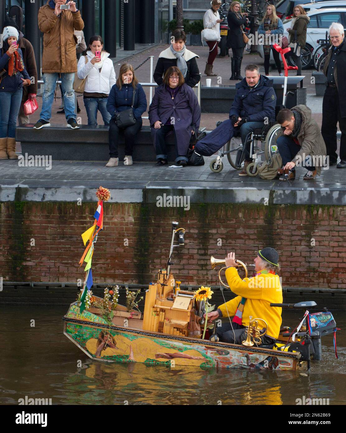 Dutchman Reinier Sijpkens plays an organ and one of his trumpets on his ...