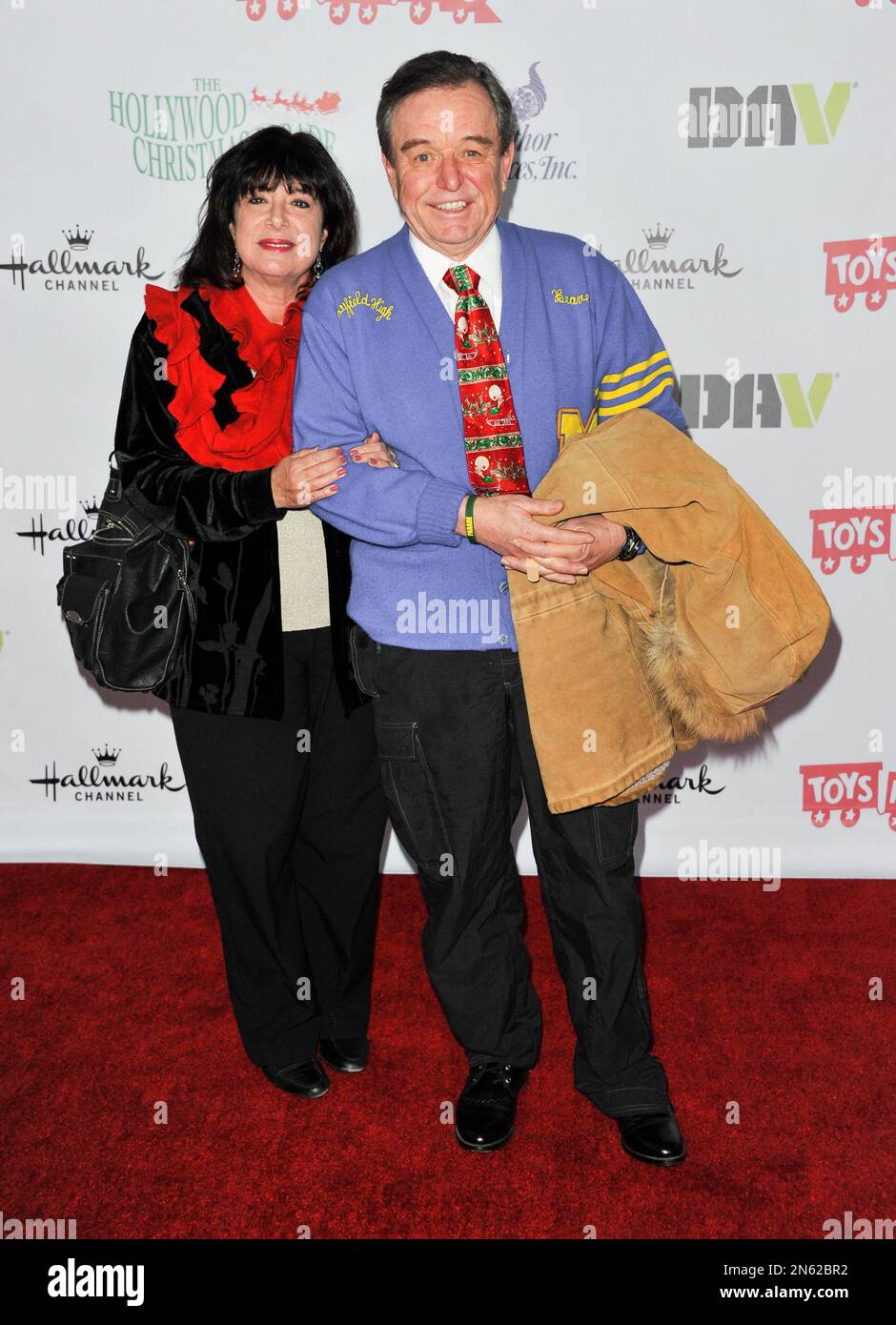 Teresa Modnick, left, and Jerry Mathers arrive at the 82nd Annual ...