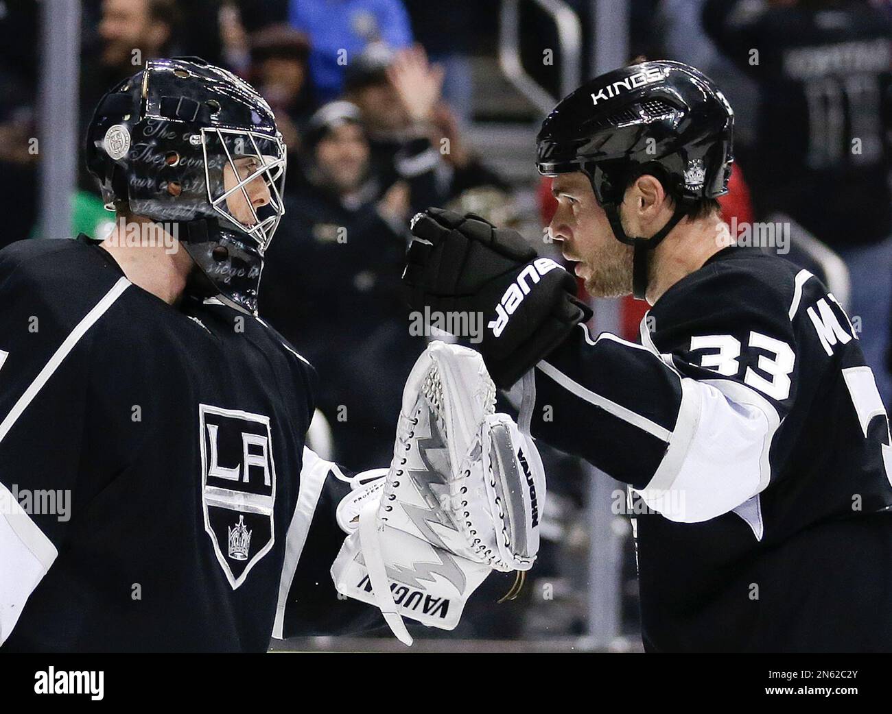 Los Angeles Kings goalie Ben Scrivens, left, and Tyler Toffoli ...