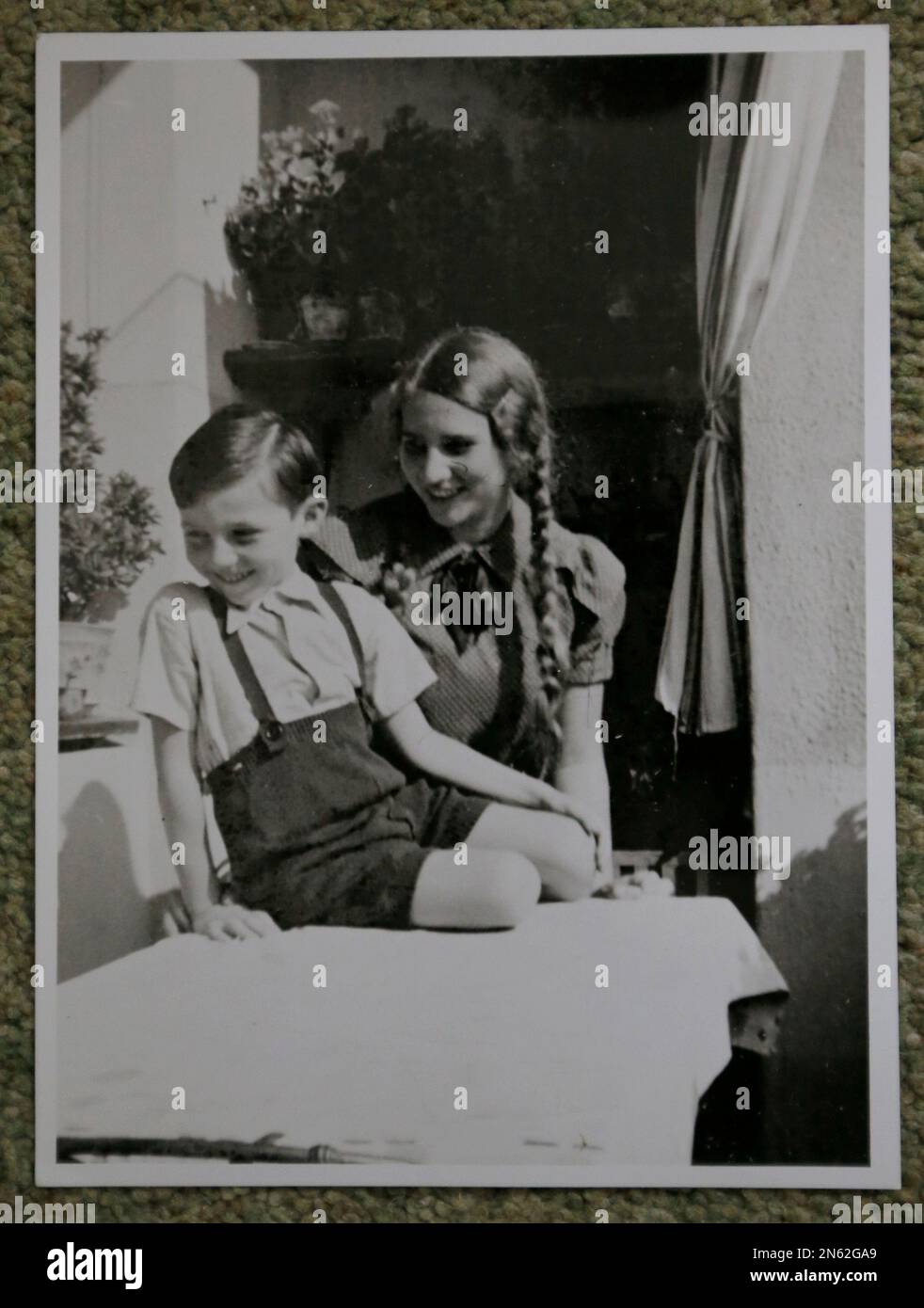 A copy of a photograph shows Herbert Levy, left, aged around five, and ...