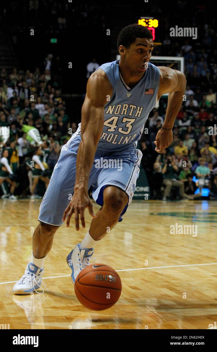 North Carolina forward James Michael McAdoo (43) dribbles the ball down ...