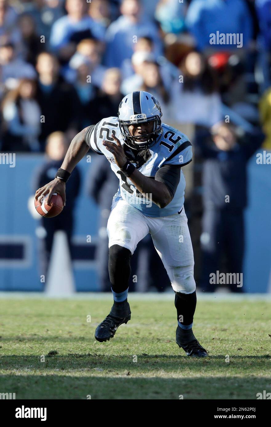 North Carolina quarterback Marquise Williams (12) scrambles during the ... North Carolina quarterback Marquise Williams (12) scrambles during the ...