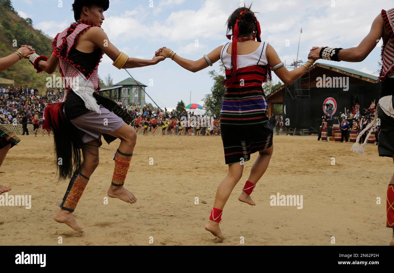 Naga dancers in traditional attire perform during the opening day of ...