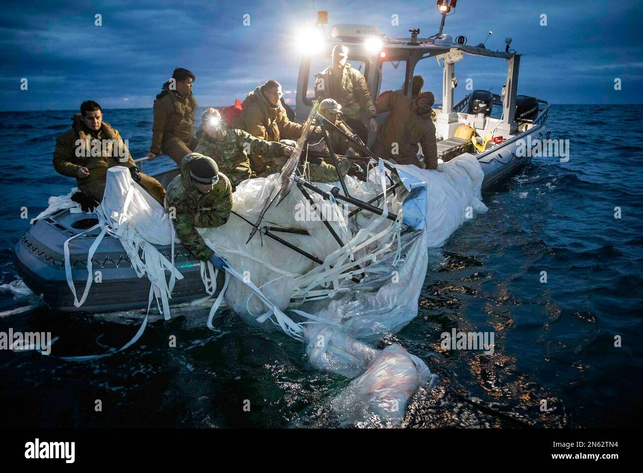 In this photo provided by the U.S. Navy, sailors assigned to Explosive ...