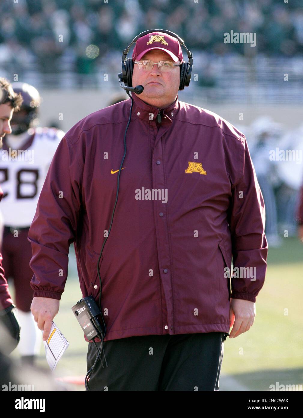 Minnesota acting head coach Tracy Claeys walks the sideline during the ...