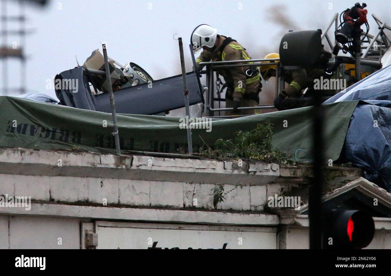 Scottish Fire and Rescue services look at the exposed part of the ...