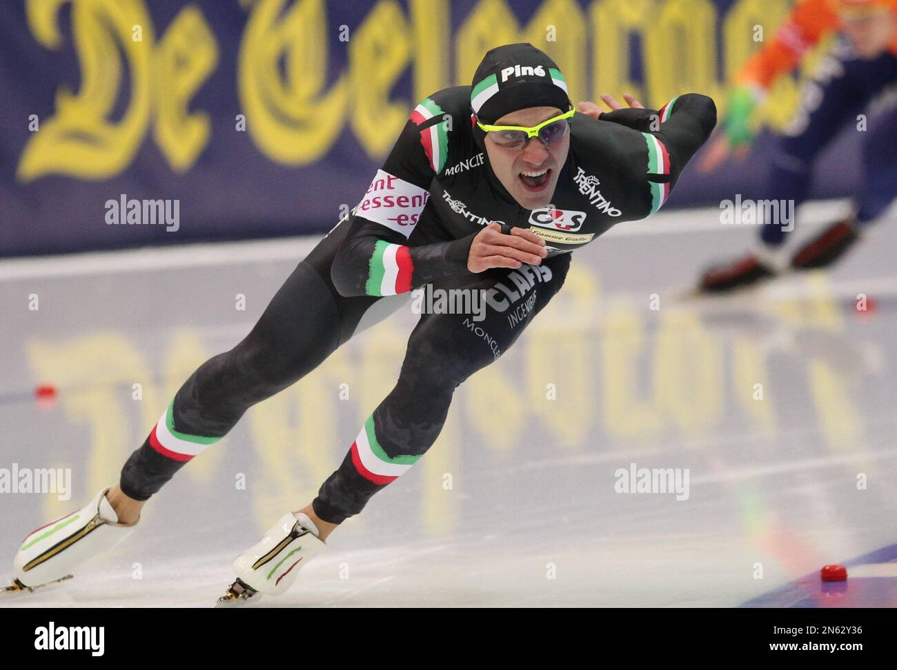 CORRECTS DISTANCE - Second placed Italy's Mirko Giacomo Nenzi skates in ...