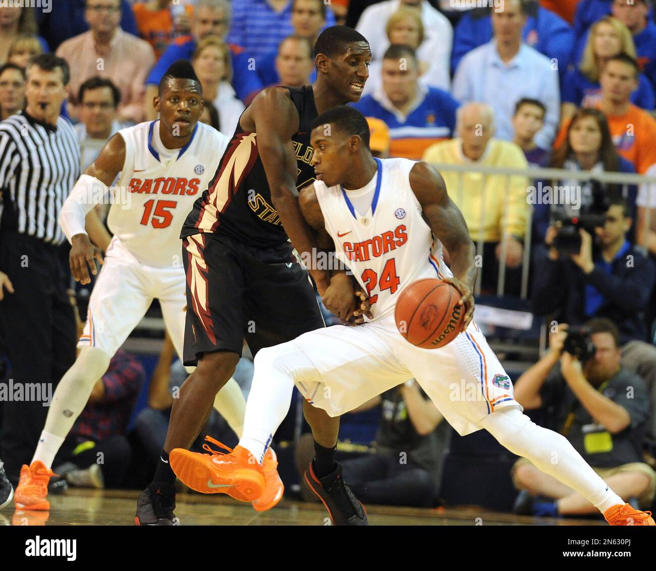 Florida forward Casey Prather (24) moves the ball around Florida State ...