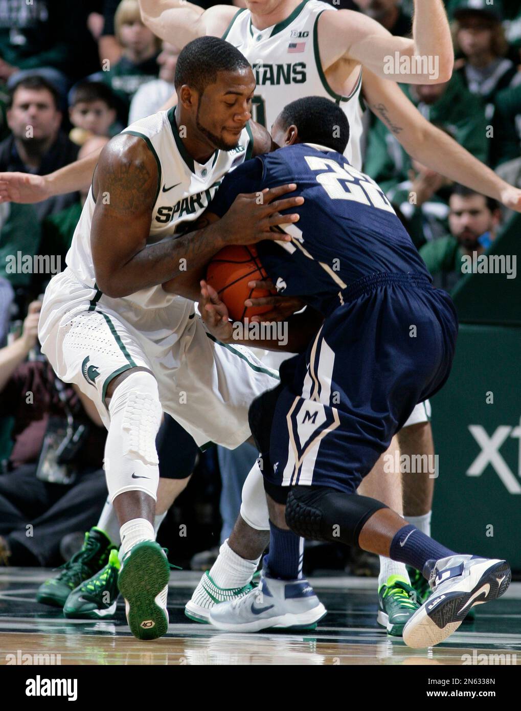 Michigan State's Branden Dawson, left, and Mount St. Mary's Rashad ...