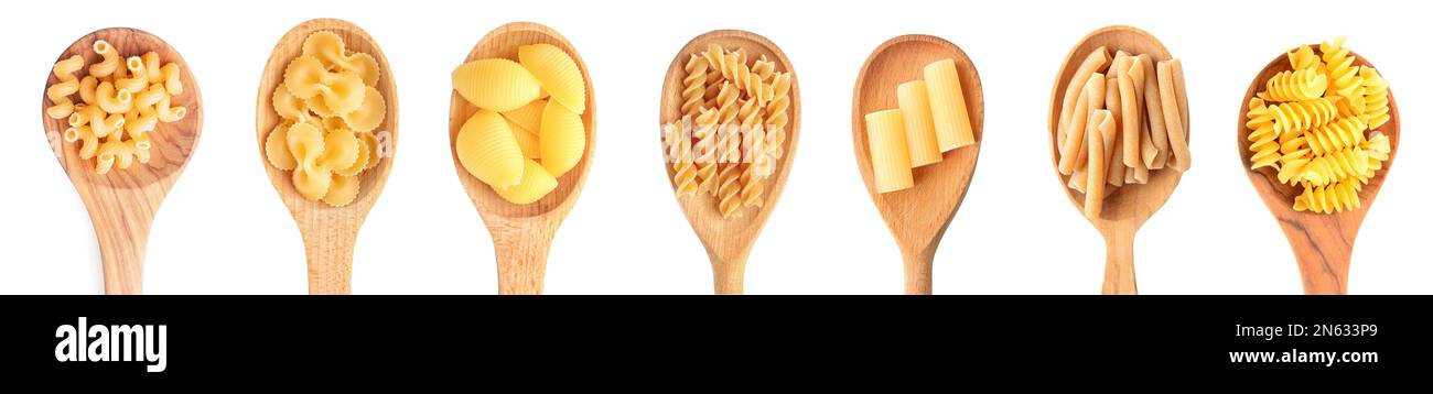 Collection of wooden spoons with different types of pasta on white ...