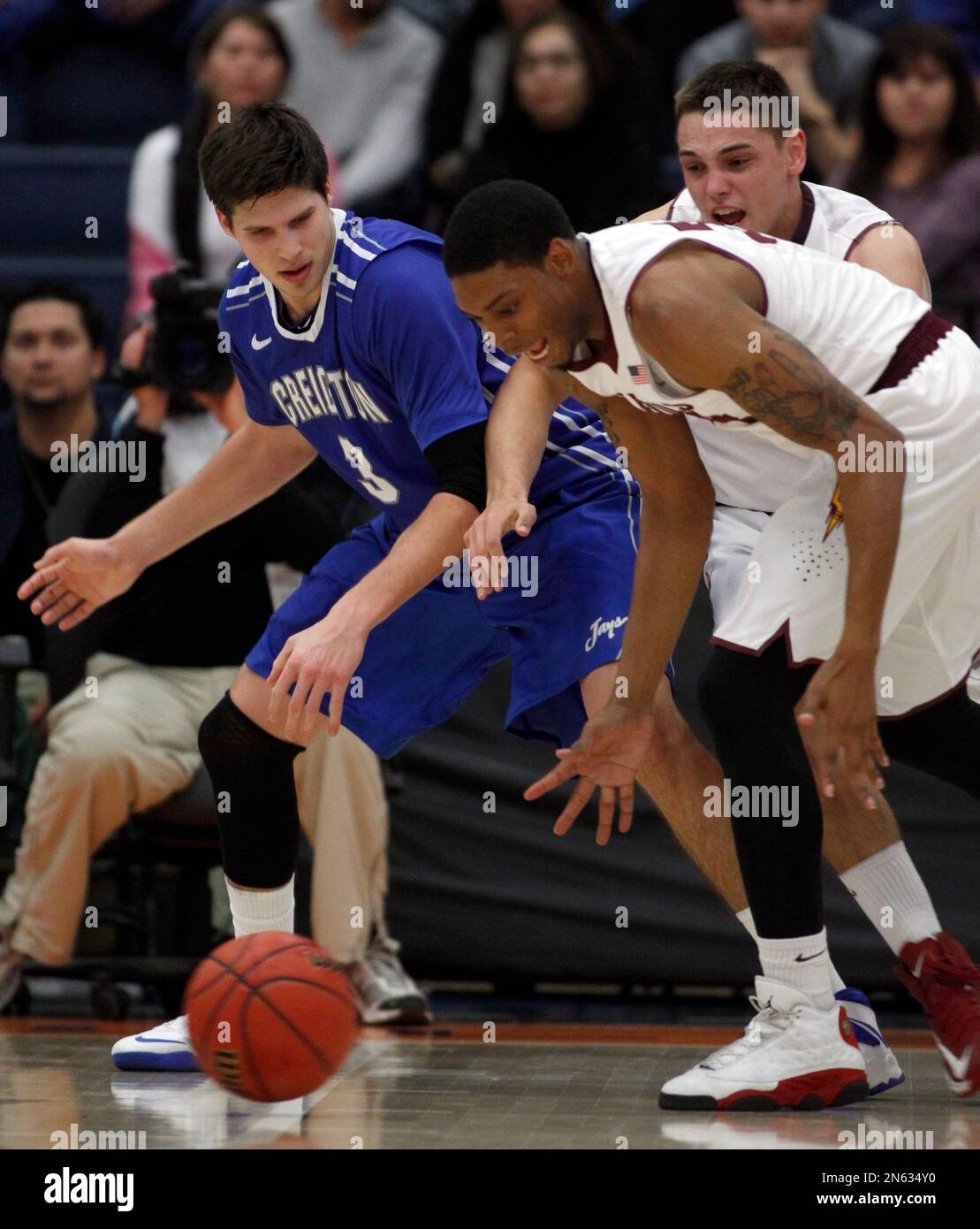 Creighton forward Doug McDermott, left, battles Arizona State guards ...