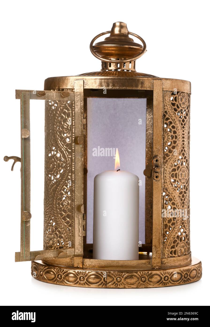 Muslim lantern with burning candle for Ramadan on white background ...