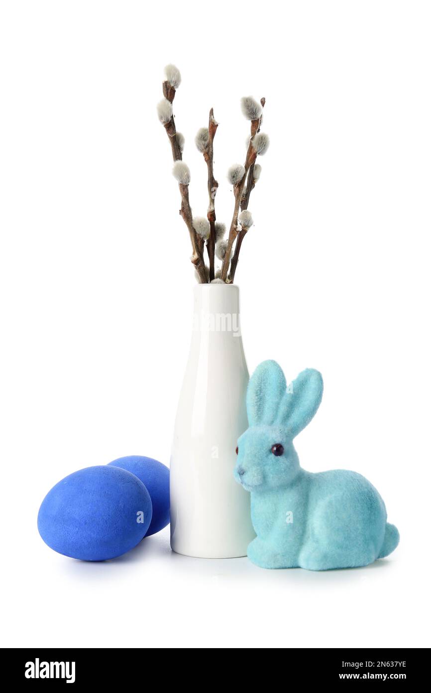 Vase with willow branches, Easter eggs and rabbit on white background ...