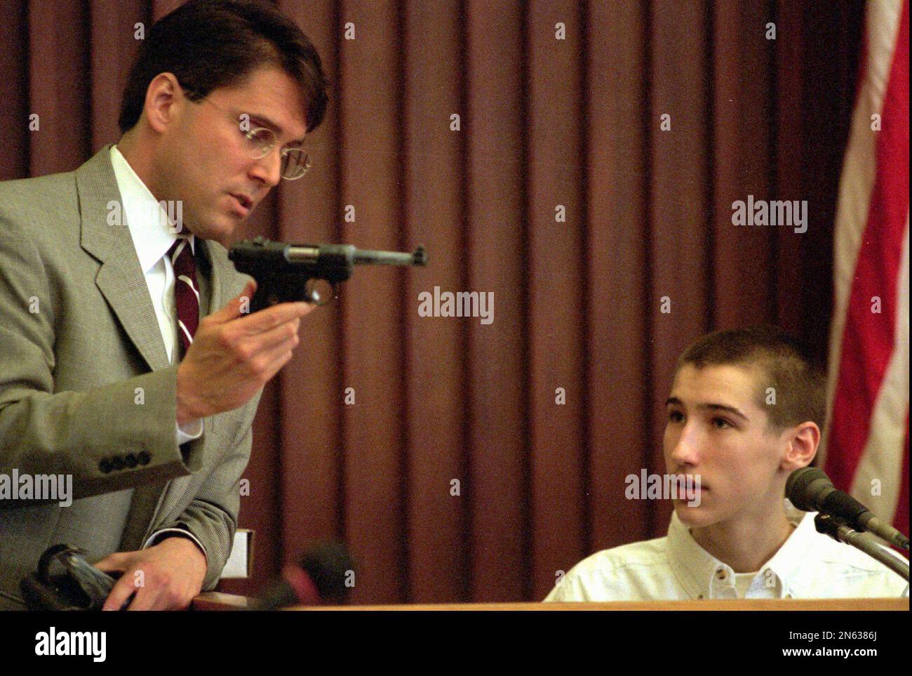 FILE- In this May 14, 1997 file photo, Jeffrey Dingman, 15, looks on as ...