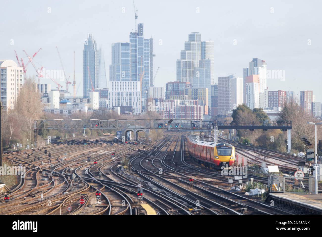 Trains at a train depot at Clapham Junction rail station. Train driver ...
