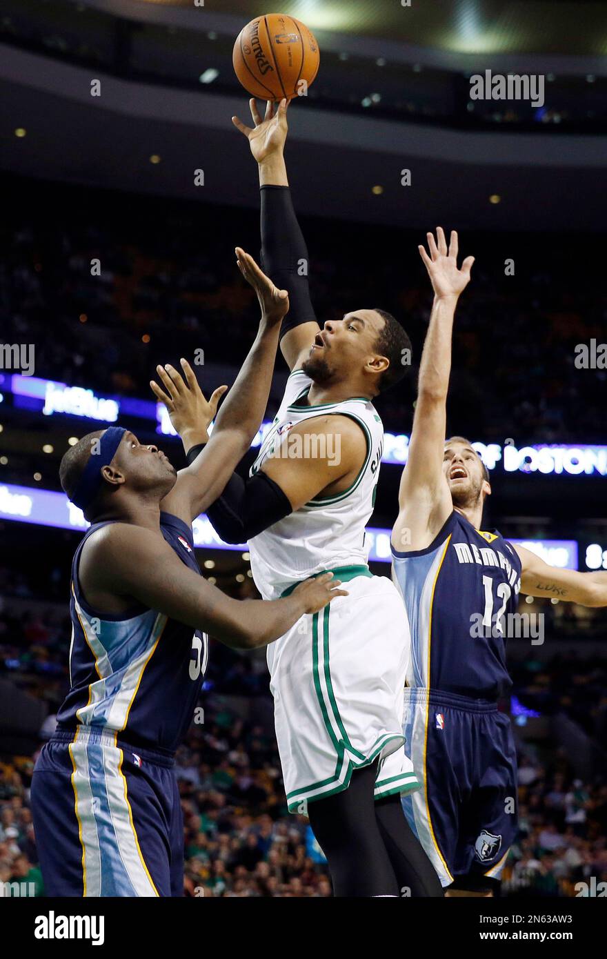 Boston Celtics' Jared Sullinger, center, shoots between Memphis ...