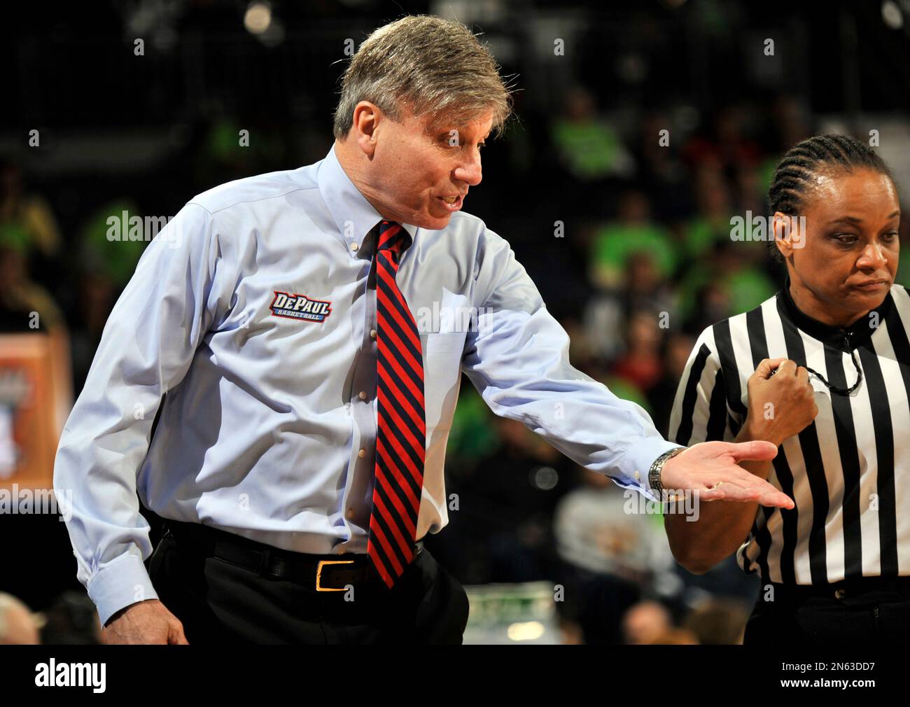 DePaul coach Doug Bruno talks to a referee during in a NCAA college ...