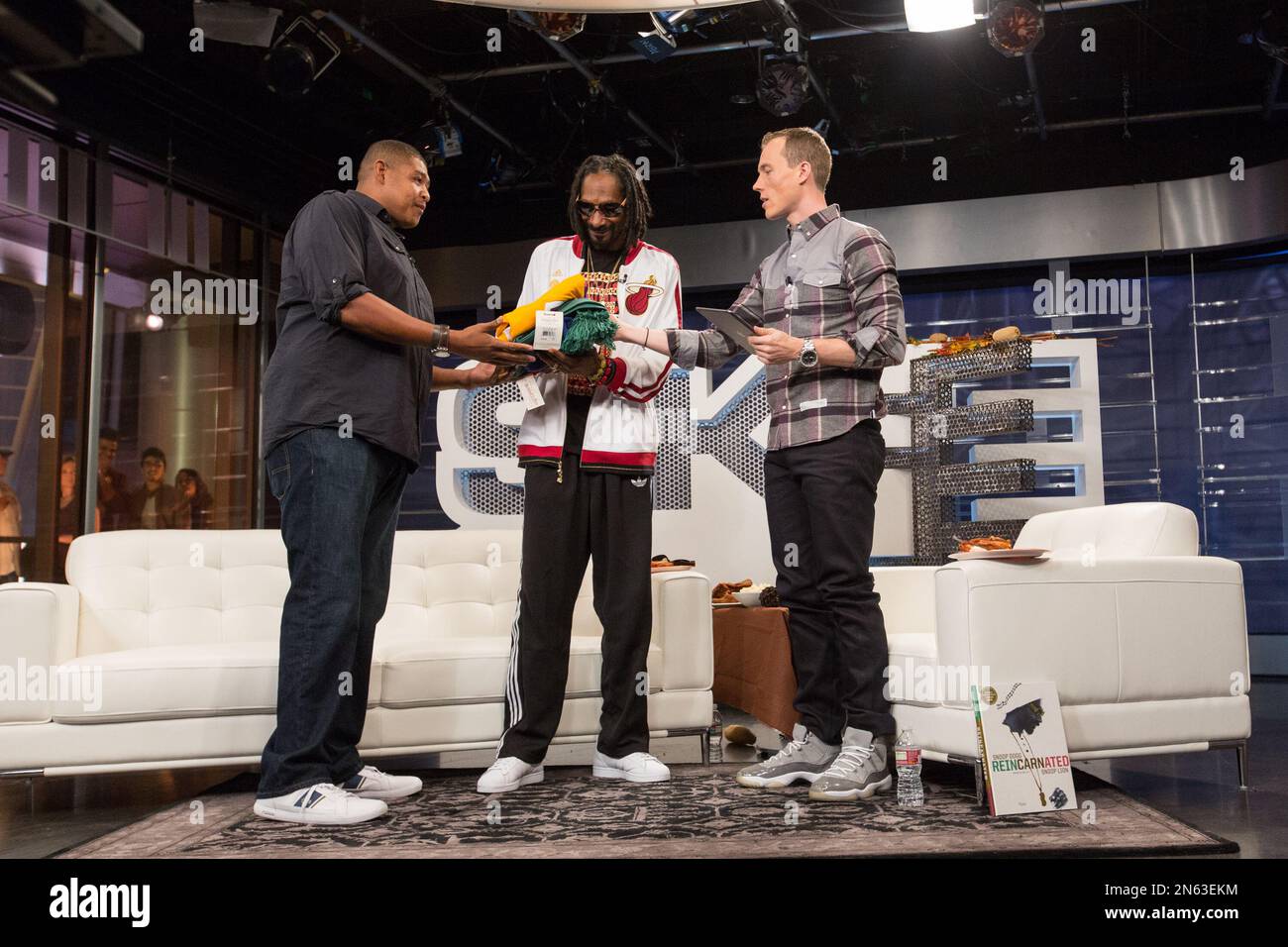 From left, actor Omar Benson Miller, Snoop Dogg, and host DJ Skee on ...