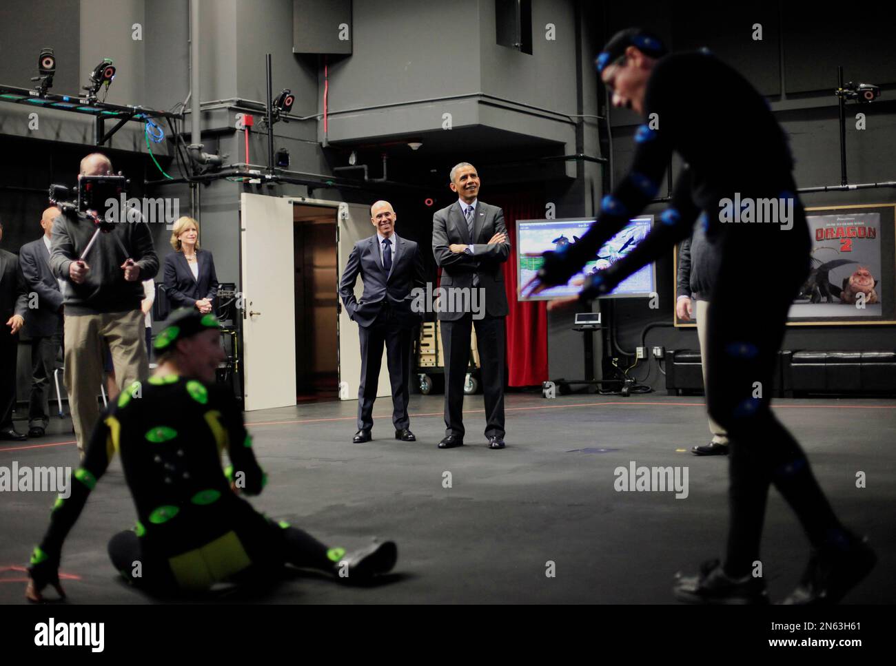 President Barack Obama, center, with DreamWorks Animation CEO Jeffrey ...