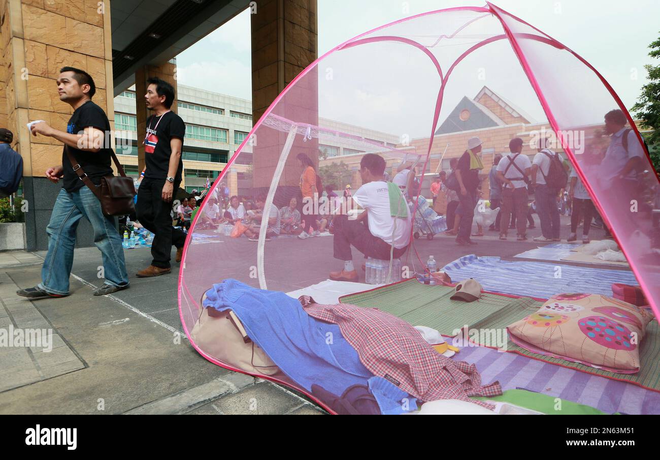Anti-government protesters stage a sit-in at the Foreign Ministry in ...